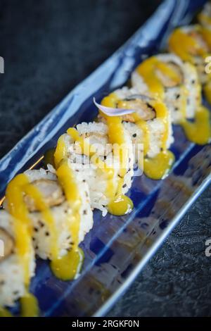 Assorted fresh fish, prawns and seafood displayed on crushed ice in a ...