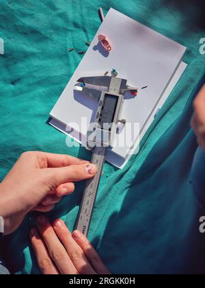 From above of crop unrecognizable preteen boy standing barefoot on ...