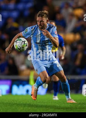 Coventry City's Matthew Godden in action with Millwall's George Saville ...