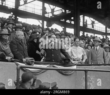 President Calvin Coolidge throws the first ball in the third game of the 1925 World Series. Bill ...