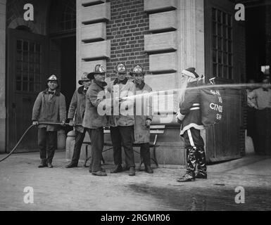 Santa Claus visiting a fire department ca. 1921 Stock Photo - Alamy