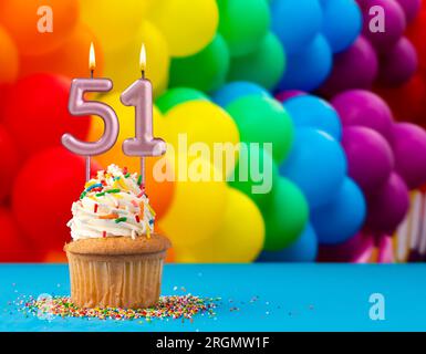 Birthday candle number 51 - Gay march flag background Stock Photo - Alamy