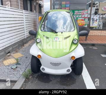A Toyota 7-Eleven convenience store electric delivery vehicle parked ...