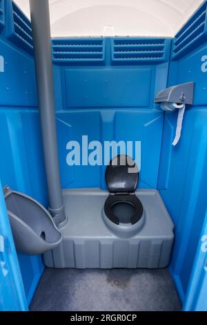 The inside of a porta potty portable toilet Stock Photo - Alamy