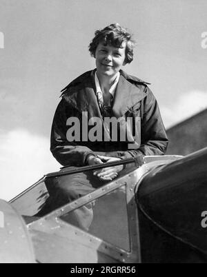 Amelia Earhart in the cockpit of her Lockheed Model 10-E Electra ...