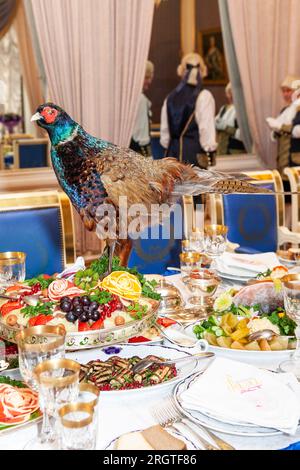 Russian-style table, dishes with caviar, cold cuts, fruits, vegetables ...