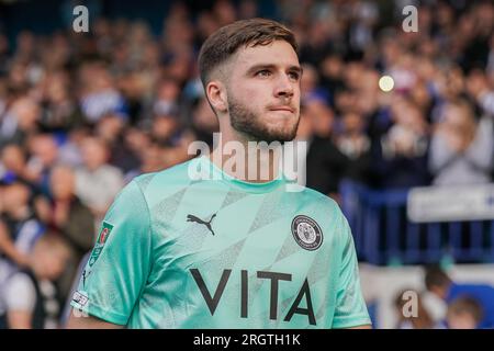 Ethan Pye #15 of Stockport County F.C.warms-up before the match during ...