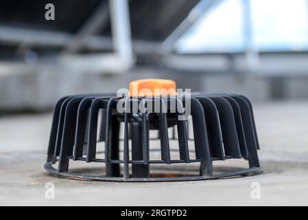 Roof drain with vents on the surface of a flat roof Stock Photo - Alamy