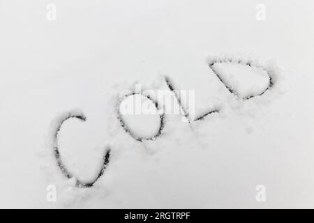 drawn on the snow, temperature symbols denoting negative very cold ...