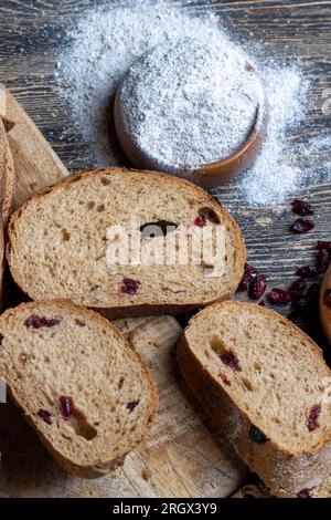 fresh cut bread made of flour and dried cranberries, red cranberry ...
