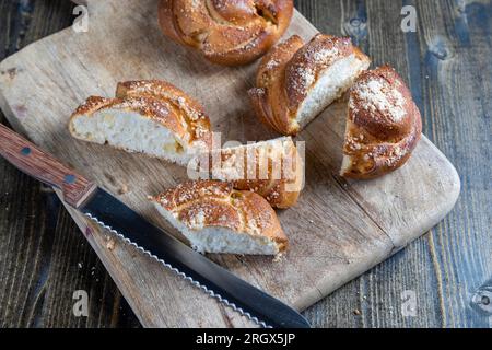 wheat fresh bun with filling cut into pieces, bun with coconut jam ...