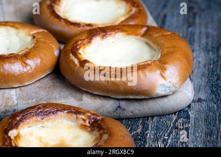 sweet dough pastries with sour cream and milk filling, vanilla sour ...
