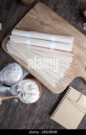 white rice noodles and flour and other ingredients, cooking rice ...