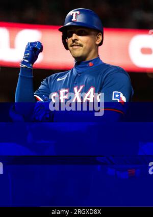 Texas Rangers' Nathaniel Lowe after he hits a double against the ...