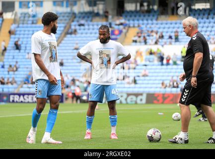 Coventry City's Ellis Simms (left) and team-mates warming up prior to ...