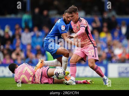 Birmingham City's Keshi Anderson (left) scores their side's first goal ...