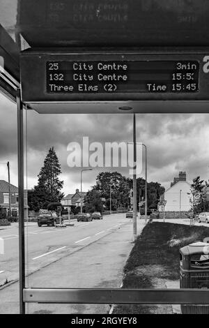Cardiff, Wales, UK - Bus timetable showing the next buses at a bus stop ...