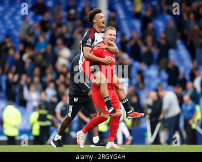 Bernd Leno and Antonee Robinson of Fulham celebrate after the teams victory following the ...