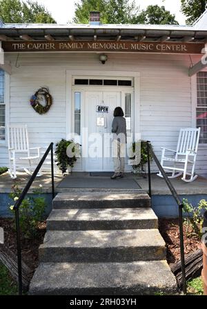 A tourist visits the small A. P. Carter store, a museum honoring The ...