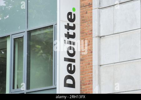Deloitte company signage Stock Photo - Alamy
