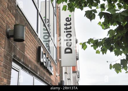 Deloitte company signage Stock Photo - Alamy