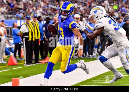 Los Angeles Chargers cornerback Ja'Sir Taylor (36) tackles Detroit ...