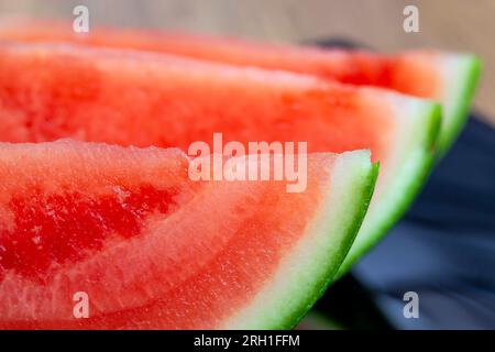 sliced ripe red watermelon without seeds, the watermelon is ripe and ...