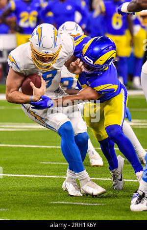 Los Angeles Rams safety Tanner Ingle (34, defensive tackle Larrell ...