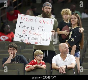 A sign of Kansas City Chiefs quarterback Patrick Mahomes with a side ...