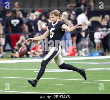 New Orleans Saints punter Blake Gillikin kicks the ball against the ...