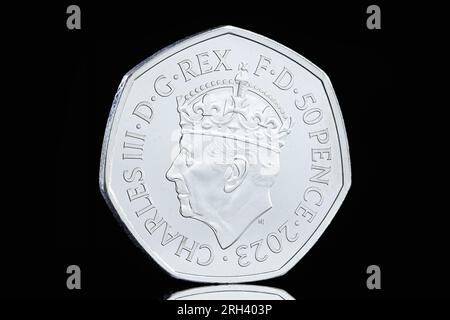 The obverse of a coronation 50p coin featuring a crowned version of ...