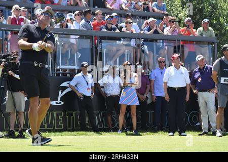 Phil Mickelson prepares to swing his put. Phil Mickelson plays in LIV ...