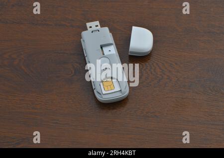Latest generation USB 5G modem close for internet connection, allowing ...