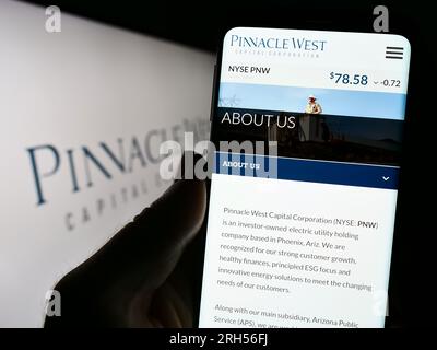 Pinnacle West Capital Company logo seen displayed on smart phone Stock ...