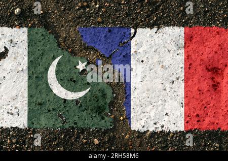 On the pavement there are images of the flags of Pakistan and India, as ...