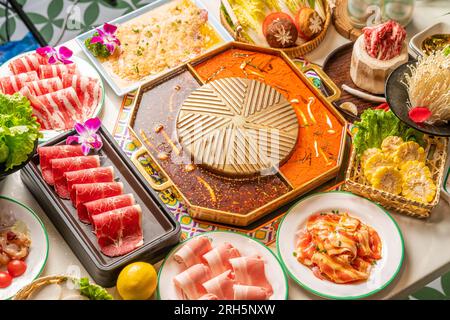 traditional hot pot combo, sweet garlic, and beef slices. It’s very ...