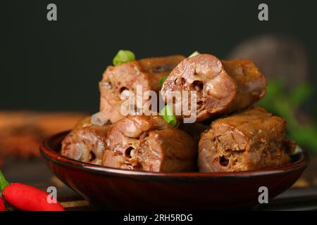 Marinated Duck neck in Spiced Sauce Stock Photo - Alamy