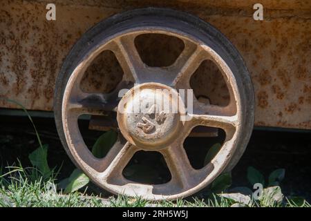 Rusty driving gears with metallic chain on a old mine train wagon for ...