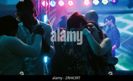 Dance partners waltzing at party, dancing in pairs on slow romantic ...
