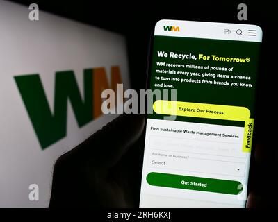 WM Waste Management collection center with trash collection truck. WM ...