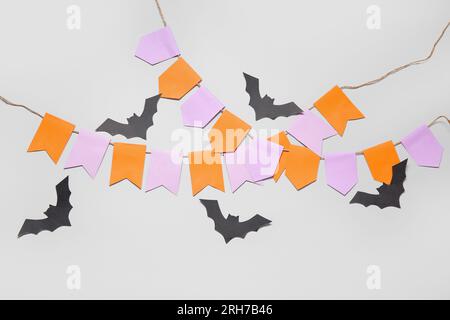 Garlands made of paper flags and bats for Halloween celebration on ...