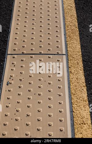 Tactile edging on a railway station platform at Kents Bank (Cumbria ...