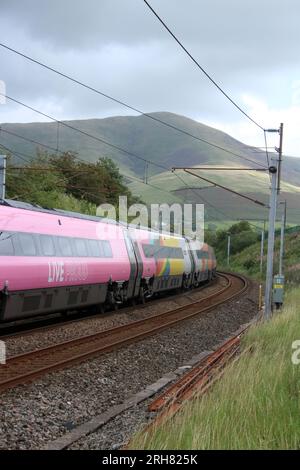 Avanti Pride Pendolino train on the West Coast Main Line. Multicoloured ...