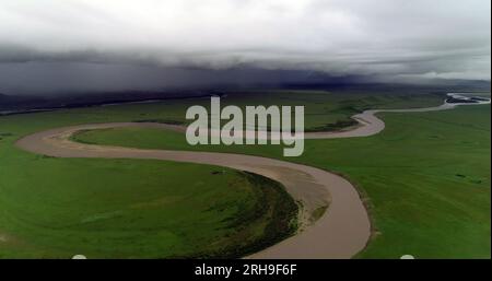 ABA, CHINA - AUGUST 11, 2023 - The Yellow River winds after rain in the ...