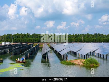 XINGHUA, CHINA - AUGUST 15, 2023 - Electricity volunteers inspect the ...