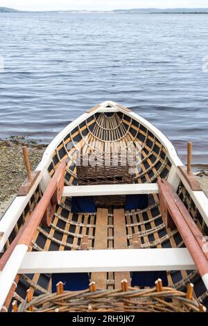 Rowing the traditional hand built currach boat, Ardara, County Donegal ...