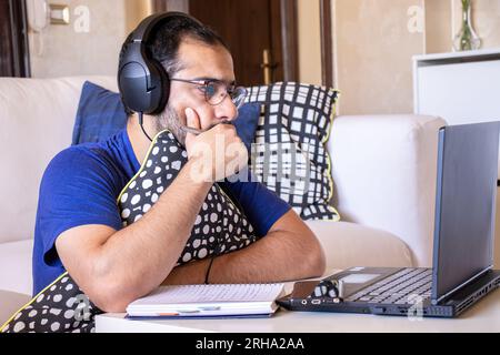 Young arabic man studying remotely Stock Photo - Alamy