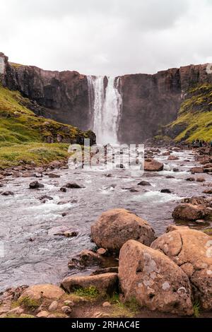 Gufufoss waterfall in summer on the Fjarðará river flowing in the ...