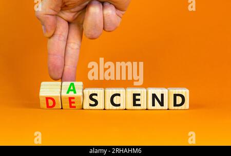Ascend or descend symbol. Concept words Ascend and Descend on wooden ...