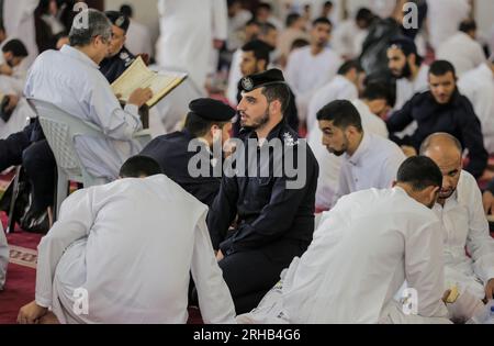 Palestinians Muslim devotees read the holy Quran during one session, at ...